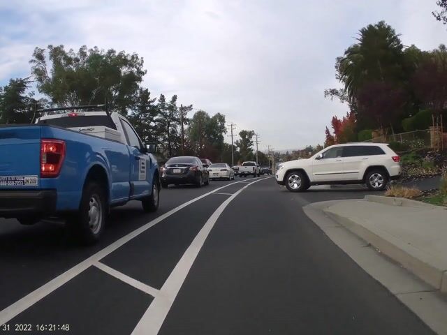 Too busy merging to notice the bike lane. - UpRide.cc